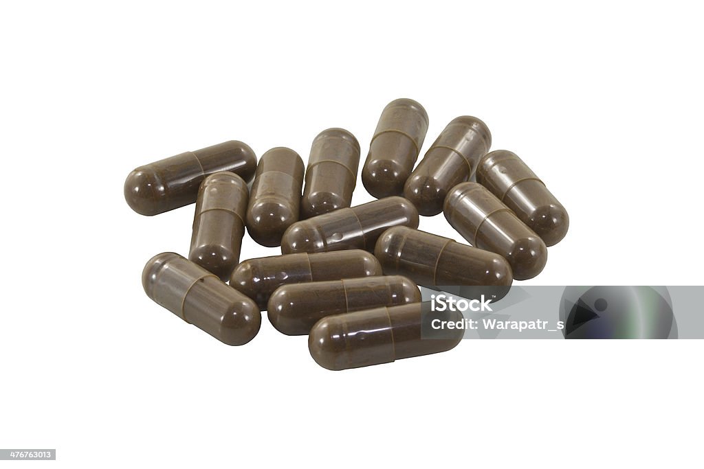 Obat Kapsul Coklat Di Atas Putih Foto Stok Unduh Gambar Sekarang Kapsul Warna Cokelat