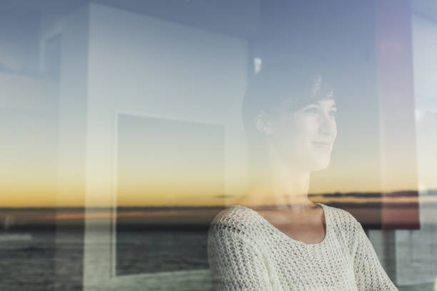 Free Stock Photo of Young woman by window reflecting nature | Download ...