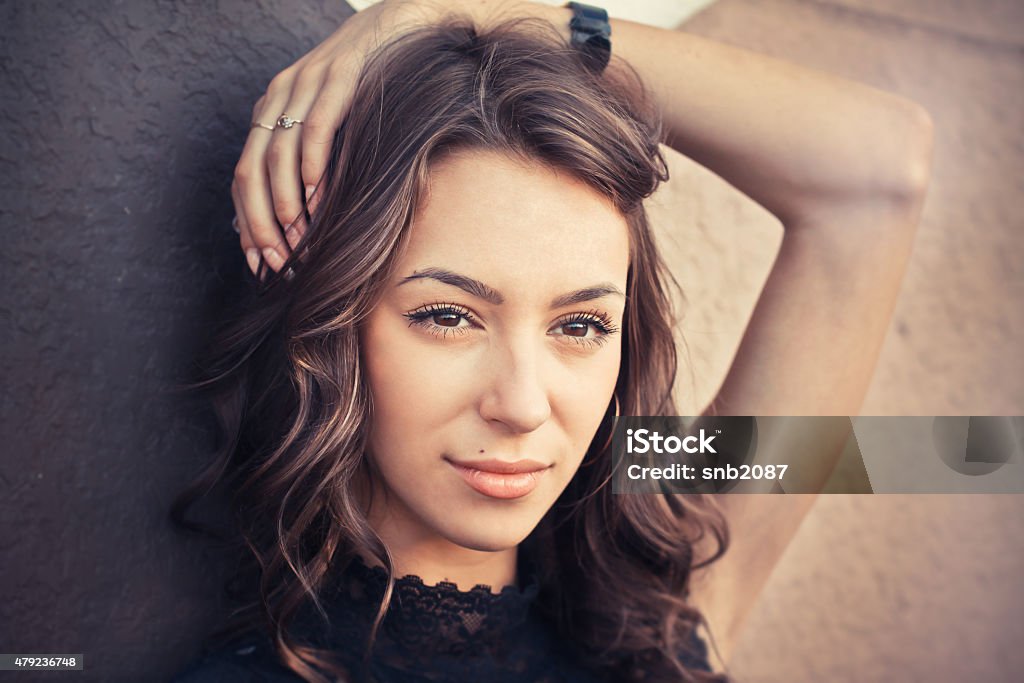 Portrait Of Beautiful Brunette Woman In Black Dress Fashion Photo Stock