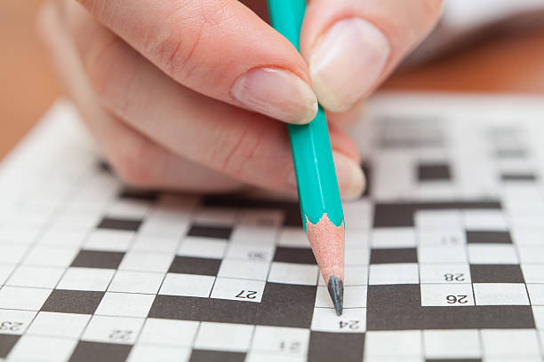 3,400+ Person Doing Crossword Puzzle Stock Photos, Pictures & Royalty ... 3,400+ Person Doing Crossword Puzzle Stock Photos, Pictures & Royalty ...