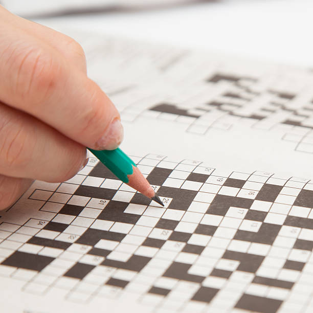 3,400+ Person Doing Crossword Puzzle Stock Photos, Pictures & Royalty ... 3,400+ Person Doing Crossword Puzzle Stock Photos, Pictures & Royalty ...