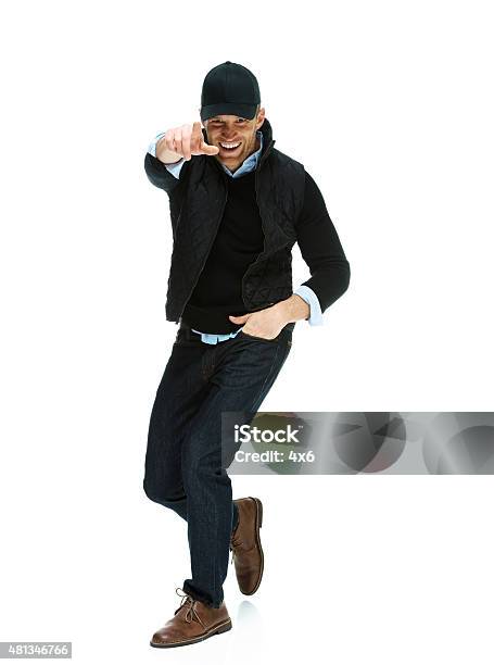 Cheerful Casual Man Pointing Towards Camera Stock Photo - Download ... Cheerful Casual Man Pointing Towards Camera Stock Photo - Download ...