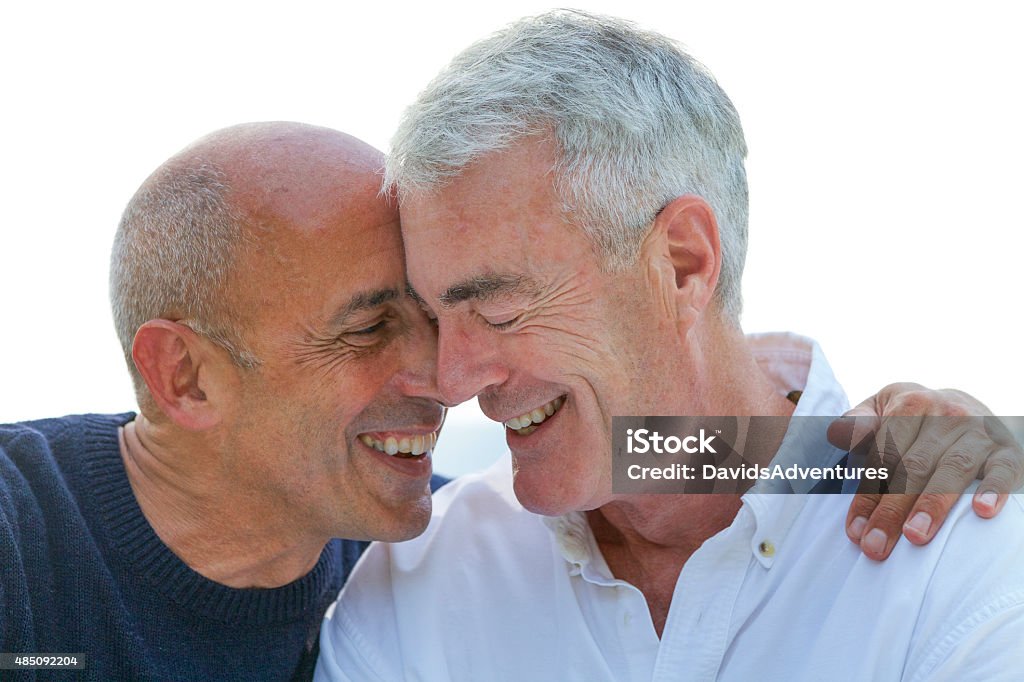 Mature Older Senior Gay Male Couple Smiling And Affectionate Stock