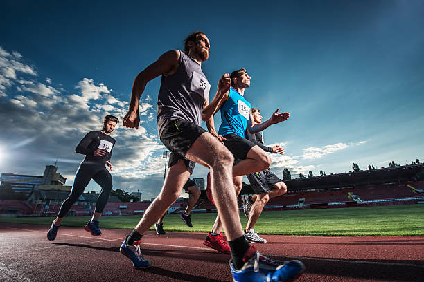 Free Stock Photo of Group of Men Running Across Track | Download Free ...
