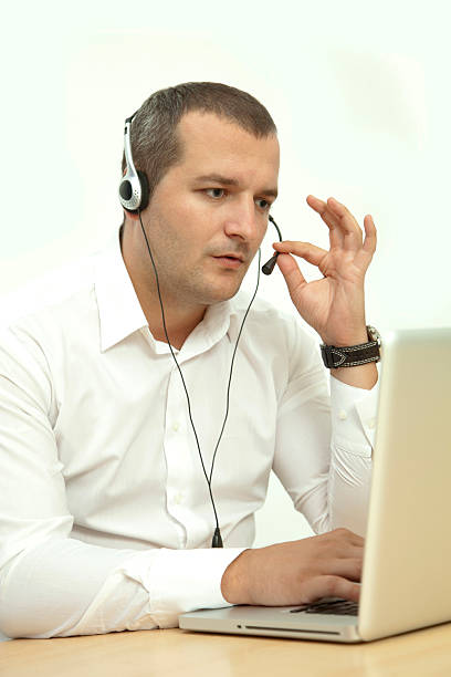 80+ Serious Call Center Agent On Phone Stock Photos, Pictures & Royalty ... 80+ Serious Call Center Agent On Phone Stock Photos, Pictures & Royalty ...
