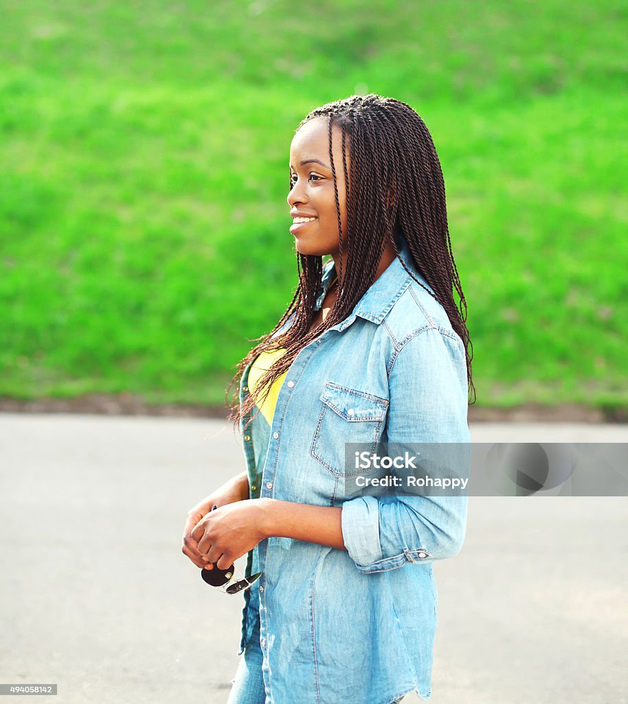 Portrait Happy Smiling African Woman Wearing A Jeans Shirt Outdo Stock