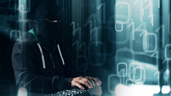 Hacker Typing On Laptop Computer Keyboard Binary Code Background Stock
