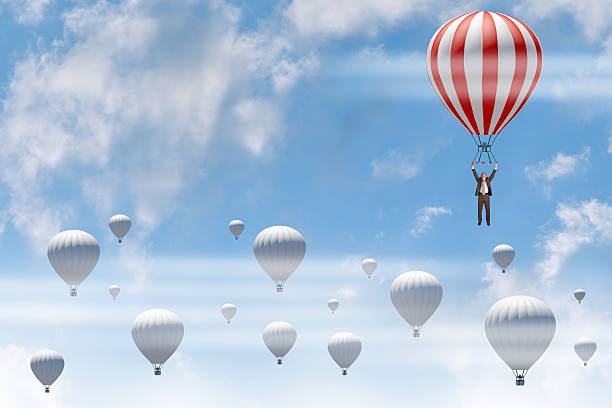 Free Stock Photo of Businessman leader rising in a hot air balloon ...