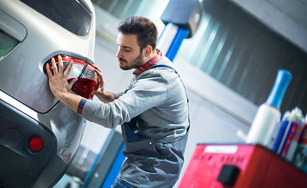 Free Stock Photo of Mechanic cleaning up car parts | Download Free ...