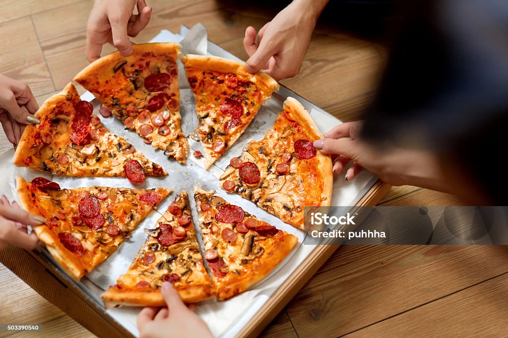 Eating Pizza Group Of Friends Sharing Pizza Fast Food Leisure Stock
