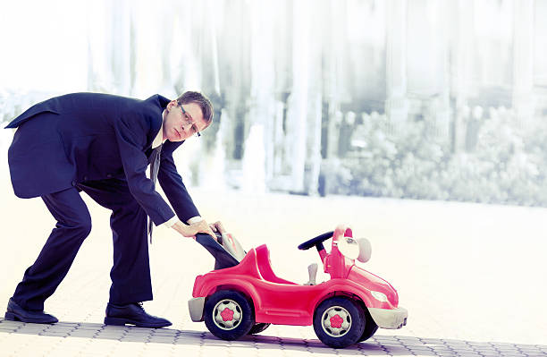 Free Stock Photo of Red Toy Car With Man Standing Beside It | Download ...