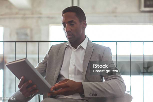 Portrait Of A Young Handsome Businessman Holding Agenda Stock Photo ... Portrait Of A Young Handsome Businessman Holding Agenda Stock Photo ...