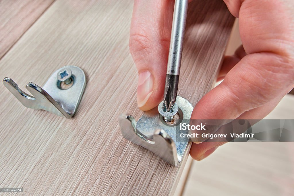 Assembling Furniture Bracket Screwing Screw Using Phillips Head