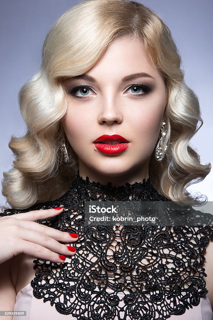 Beautiful Blonde In Hollywood Manner With Curls And Red Lips Stock