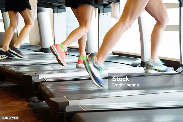 Unrecognizable People Running On Treadmills Stock Photo - Download ... Unrecognizable People Running On Treadmills Stock Photo - Download ...