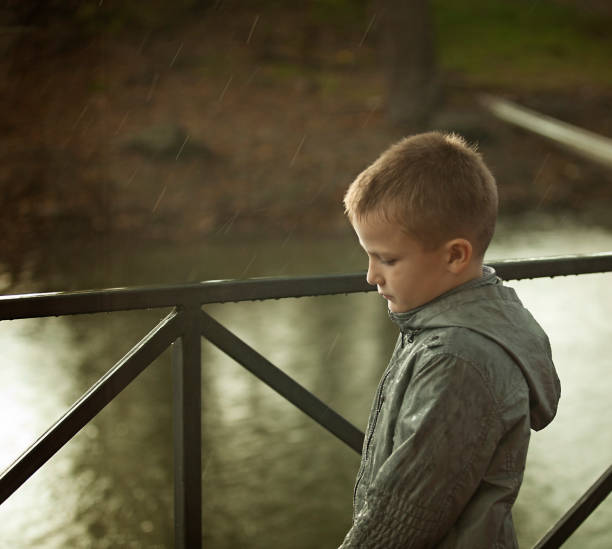Free Stock Photo of Sad little boy waiting outside | Download Free ...