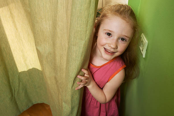 160+ Person Peaking Behind Curtain Stock Photos, Pictures & Royalty ... 160+ Person Peaking Behind Curtain Stock Photos, Pictures & Royalty ...