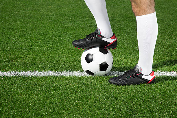 Free Stock Photo of Football players feet with ball on ground ...