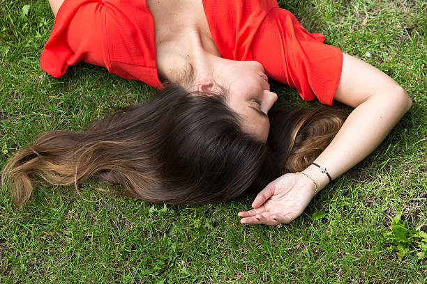 Free Stock Photo of A contorted woman lying on a striped floor ...