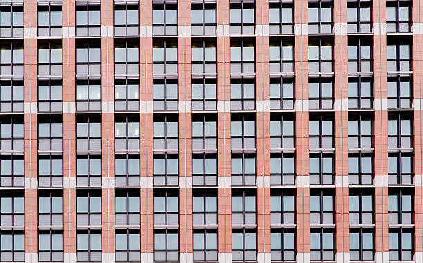Free Stock Photo of Brick building with staggered rectangular windows ...