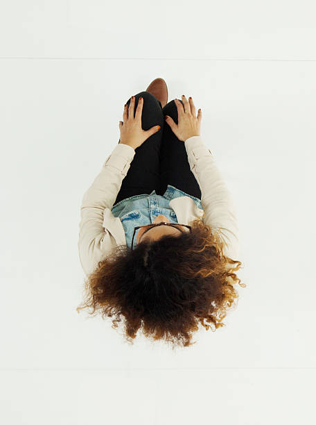 Free Stock Photo of A contorted woman lying on a striped floor ...