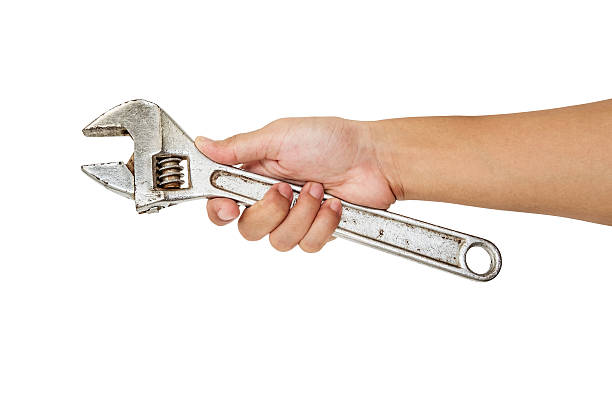 Free Stock Photo of Hand holding adjustable crescent wrench | Download ...