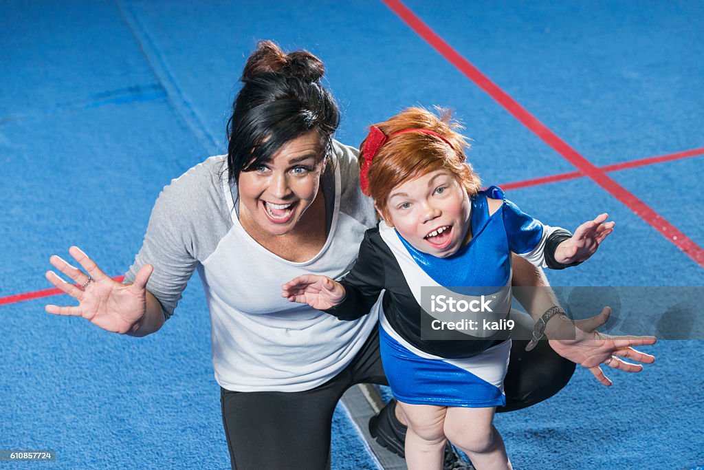 Coach And Cheerleader On Special Needs Team Acting Goofy Stock Photo ... Coach And Cheerleader On Special Needs Team Acting Goofy Stock Photo ...