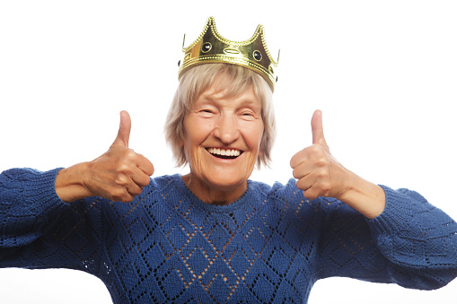 Senior Woman Wearing Crown Doing Funky Action Stock Photo - Download ... Senior Woman Wearing Crown Doing Funky Action Stock Photo - Download ...