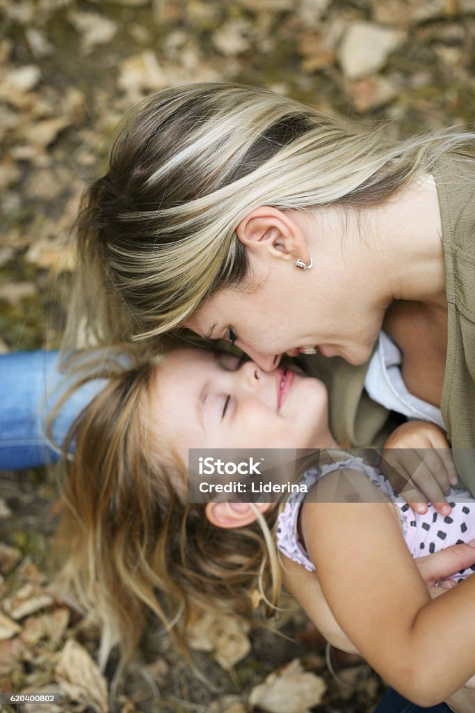 Cheerful Mother With Her Daughter Outdoor Stock Photo - Download Image ... Cheerful Mother With Her Daughter Outdoor Stock Photo - Download Image ...