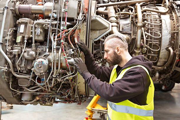 Free Stock Photo of Man Standing Next to Large Jet Engine | Download ...