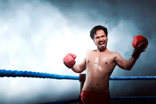 Athlete Male Asian Boxer Performing Uppercut Stock Photo - Download ... Athlete Male Asian Boxer Performing Uppercut Stock Photo - Download ...