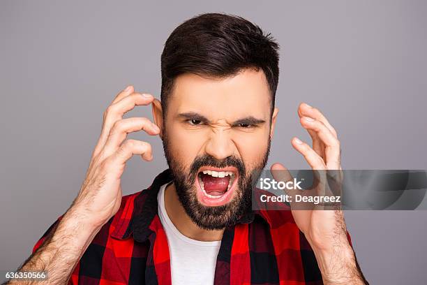 Handsome Depressed Young Man Screaming And Showing Hands Stock Photo ... Handsome Depressed Young Man Screaming And Showing Hands Stock Photo ...