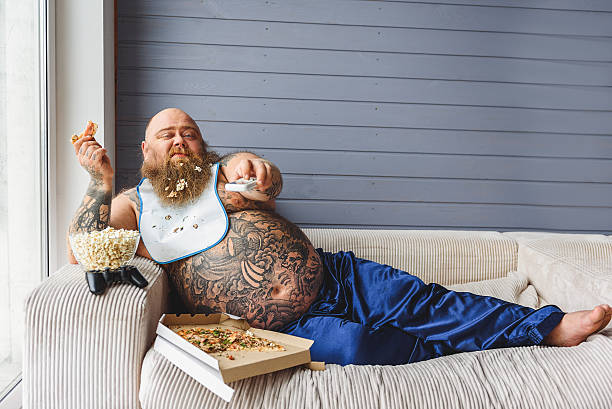 870+ Fat Man Lying Down Stock Photos, Pictures & Royalty-Free Images ... 870+ Fat Man Lying Down Stock Photos, Pictures & Royalty-Free Images ...