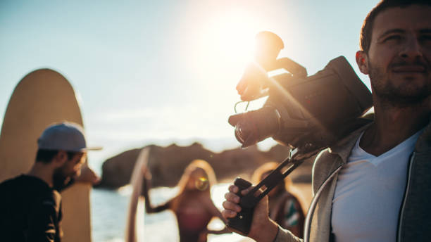 Free Stock Photo of Filmmaker with camera rig at beach | Download Free ...