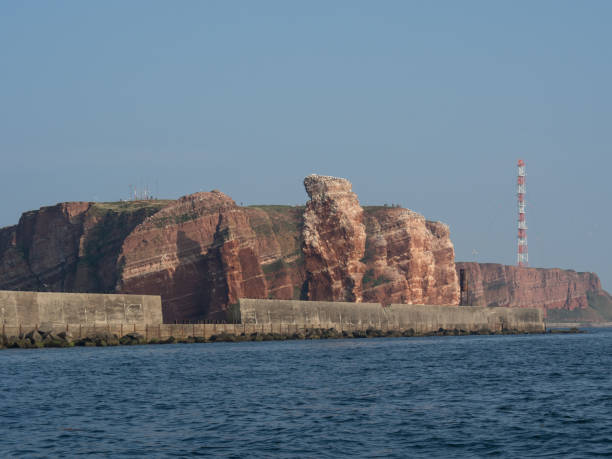 Helgoland’s Towering Rock Formations And Pier – Free Stock Photo