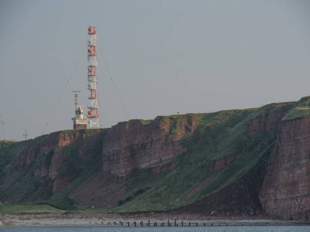 Helgoland’s Towering Rock Formations And Pier – Free Stock Photo