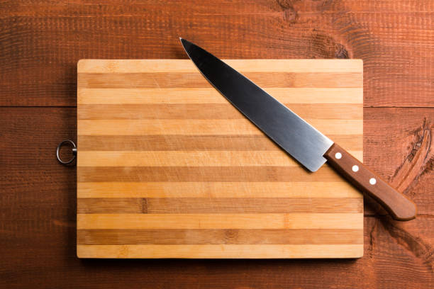 Free Stock Photo of Close Up of a Knife on a Cutting Board | Download ...
