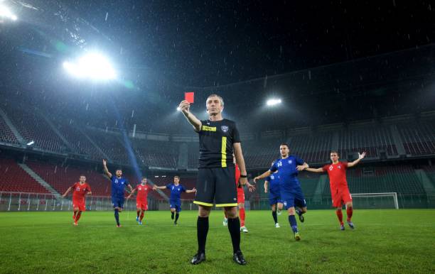Free Stock Photo of Referee Standing Next to Football Player on Field ...