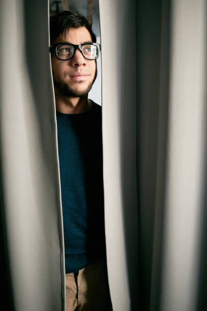 160+ Person Peaking Behind Curtain Stock Photos, Pictures & Royalty ... 160+ Person Peaking Behind Curtain Stock Photos, Pictures & Royalty ...