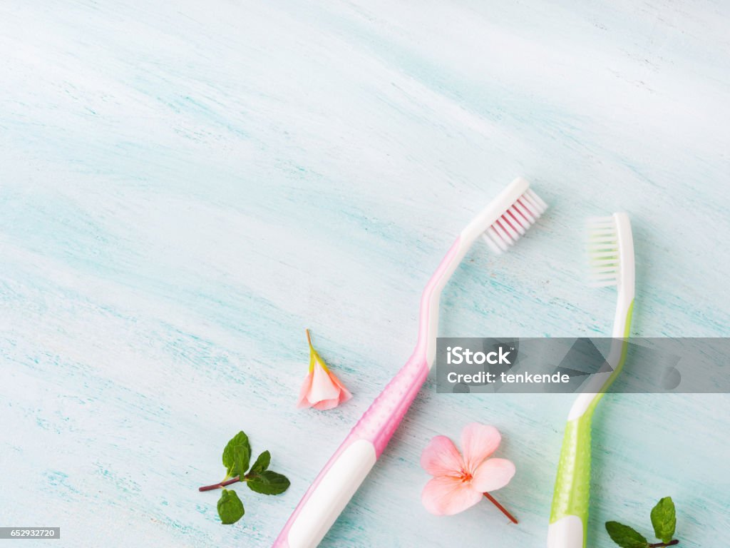 Dental Hygiene Concept Toothbrushes Flowers Mint Stock Photo - Download ... Dental Hygiene Concept Toothbrushes Flowers Mint Stock Photo - Download ...