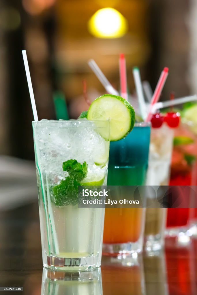 Two Fresh Mojitos Cocktail On Wooden Background Mojitos With Mint Leaves Lime And Ice Stock