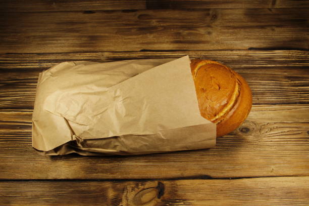 Free Stock Photo of Loaf of Bread on Top of Paper | Download Free ...