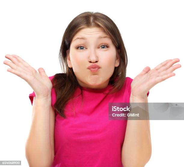 Portrait Of Confused Young Woman Complaining With Raised Hands And ... Portrait Of Confused Young Woman Complaining With Raised Hands And ...