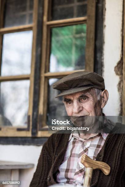 87 Years Old Man Sitting In Front Of Old Village House Stock Photo ... 87 Years Old Man Sitting In Front Of Old Village House Stock Photo ...