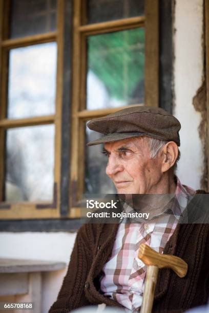 87 Years Old Man Sitting In Front Of Old Village House Stock Photo ... 87 Years Old Man Sitting In Front Of Old Village House Stock Photo ...