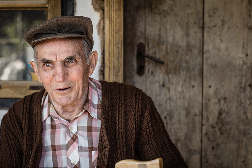 87 Years Old Man Sitting In Front Of Old Village House Stock Photo ... 87 Years Old Man Sitting In Front Of Old Village House Stock Photo ...