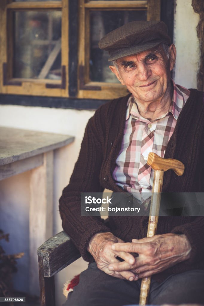 87 Years Old Man Sitting In Front Of Old Village House Stock Photo ... 87 Years Old Man Sitting In Front Of Old Village House Stock Photo ...