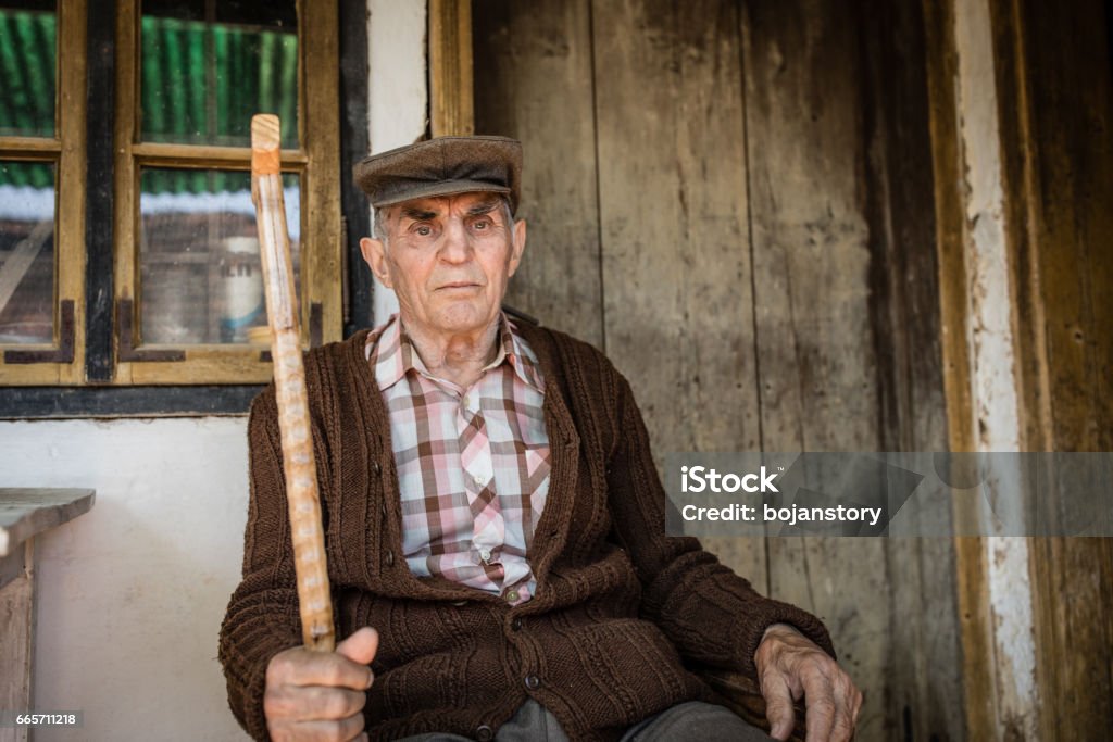 87 Years Old Man Sitting In Front Of Old Village House Stock Photo ... 87 Years Old Man Sitting In Front Of Old Village House Stock Photo ...