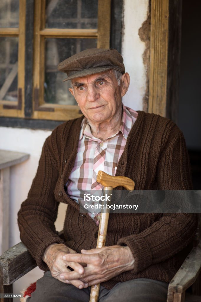 87 Years Old Man Sitting In Front Of Old Village House Stock Photo ... 87 Years Old Man Sitting In Front Of Old Village House Stock Photo ...