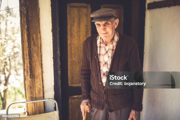 87 Years Old Man Sitting In Front Of Old Village House Stock Photo ... 87 Years Old Man Sitting In Front Of Old Village House Stock Photo ...